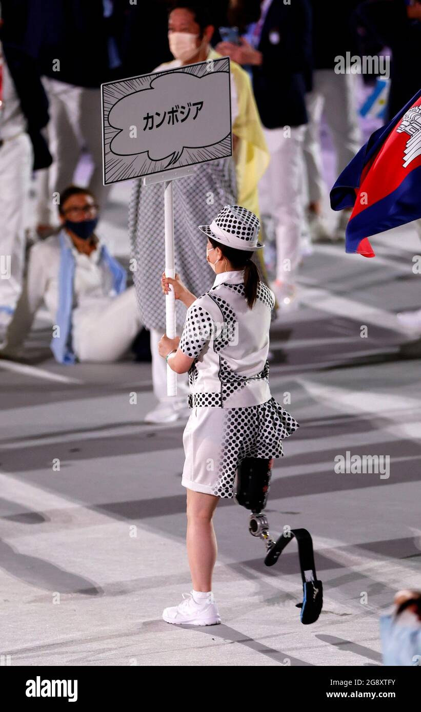 Tokyo, Japan. 23rd July, 2021. Placard bearer of Cambodia parades into ...
