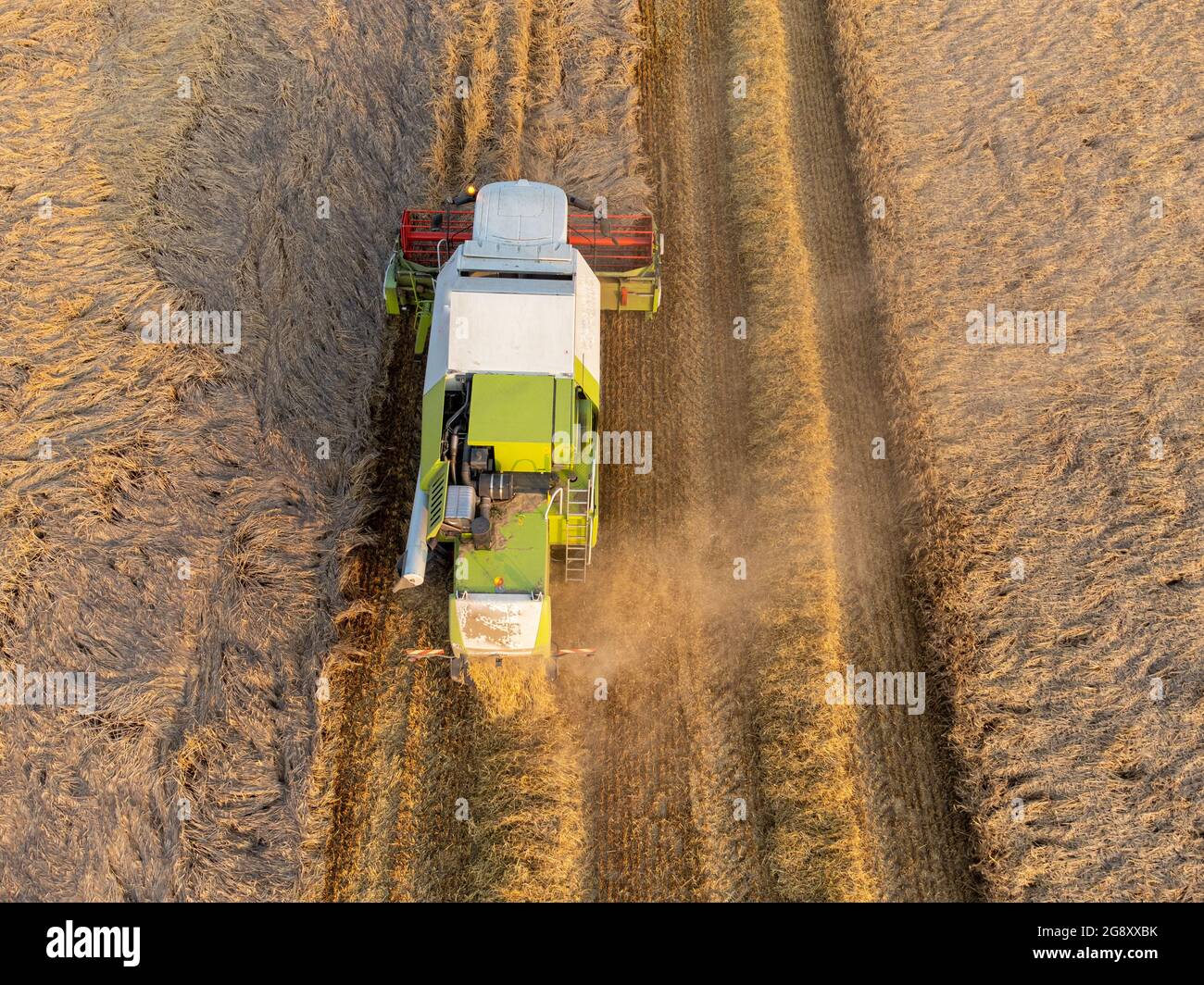Aerial view of a combine harvester on a grain field Stock Photo - Alamy