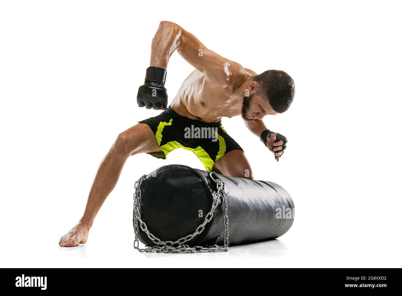 MMA. Professional male thai boxer training isolated on white studio ...