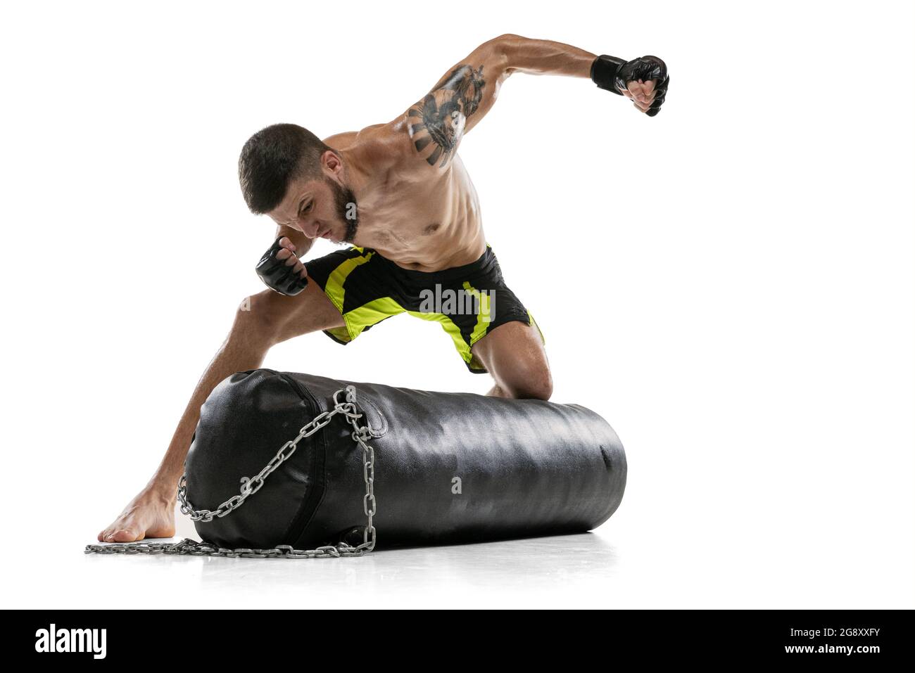 MMA. Professional male thai boxer training isolated on white studio ...