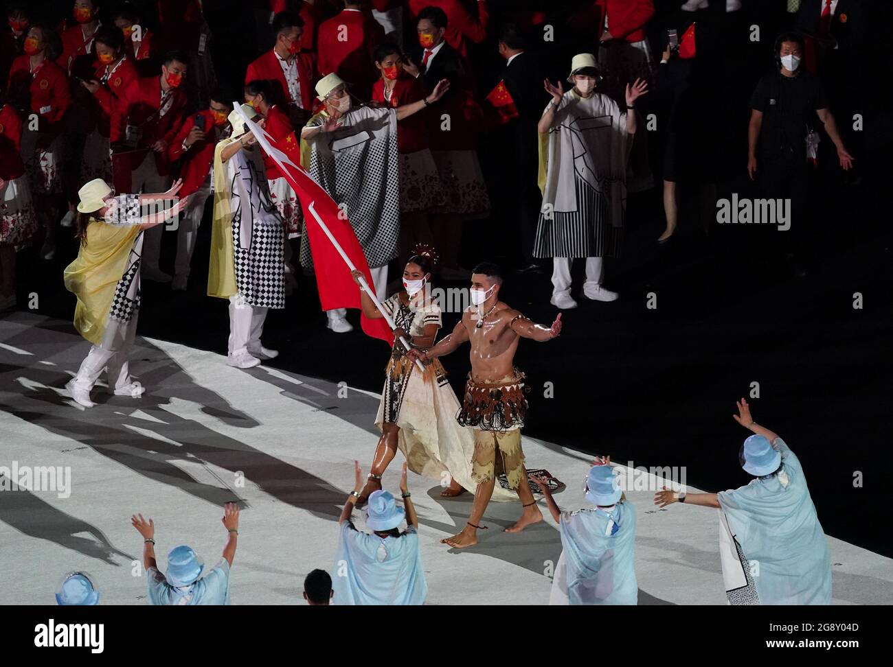 The Tonga Olympic team with Malia Paseka and Pita Taufatofua carrying ...