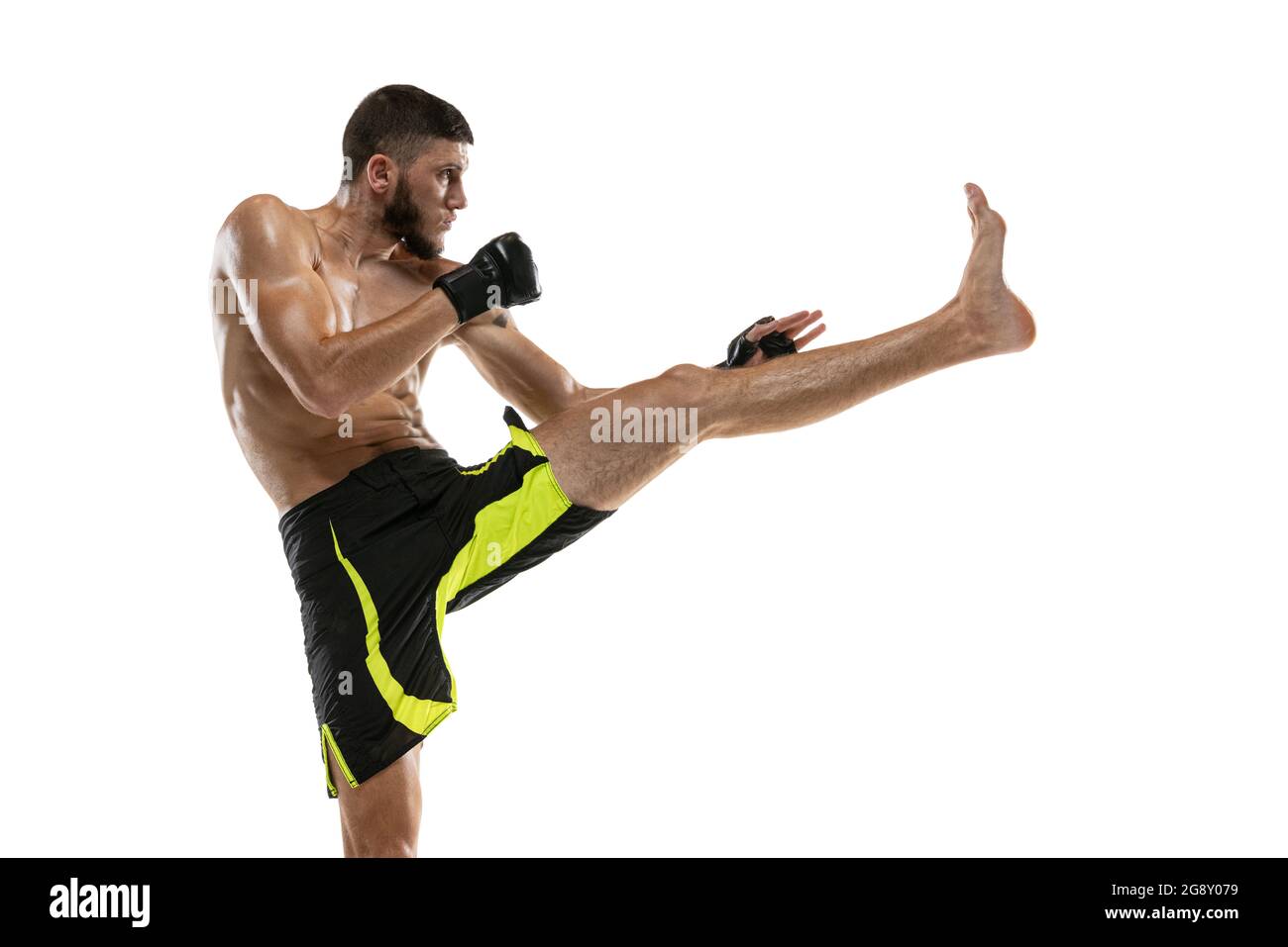 Professional male MMA boxer in motion isolated on white studio ...