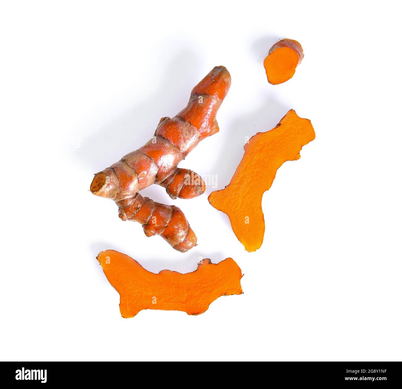 turmeric isolated on white background Stock Photo - Alamy