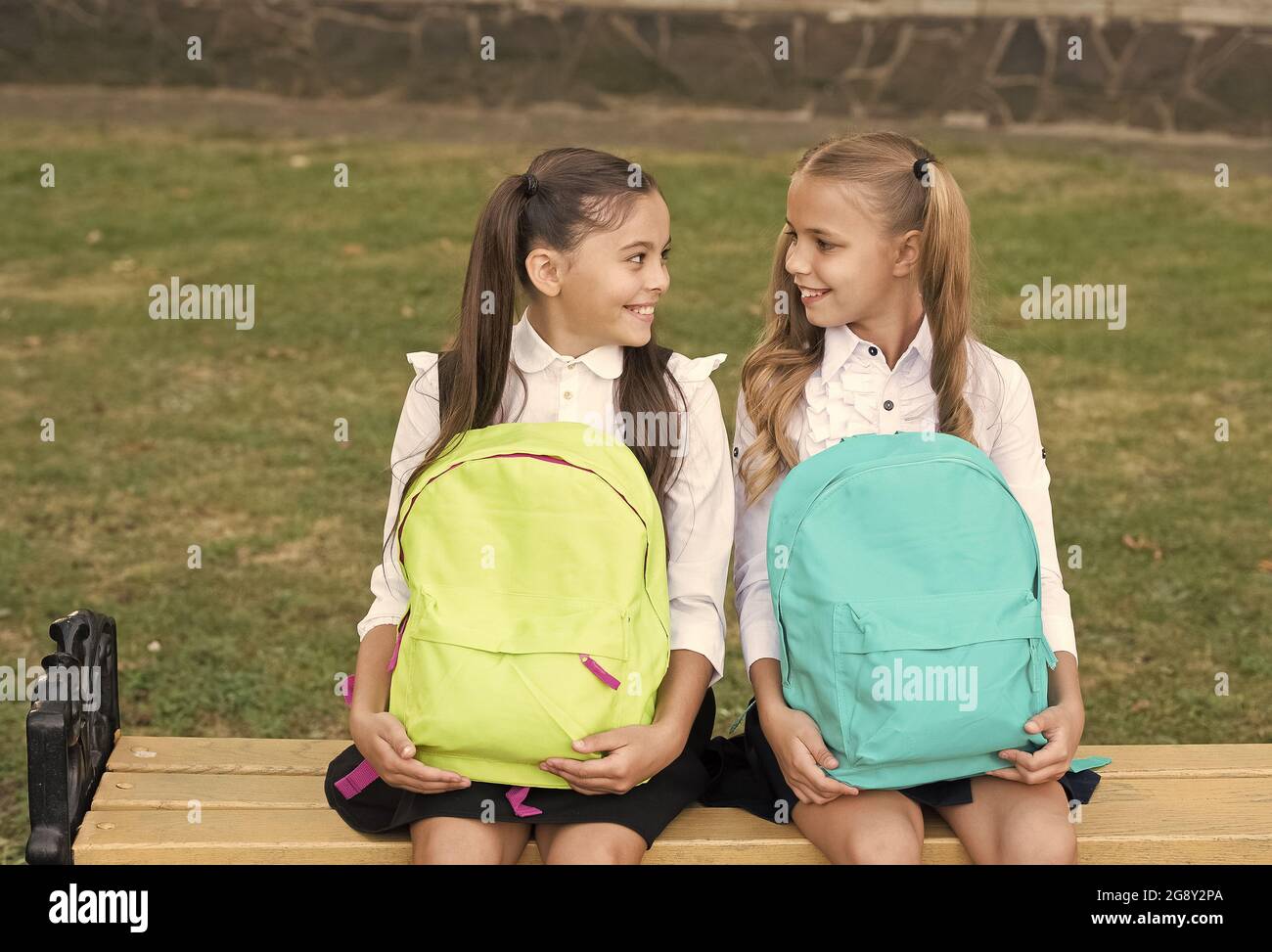 Cute classmates girls with backpacks, school friends concept Stock ...
