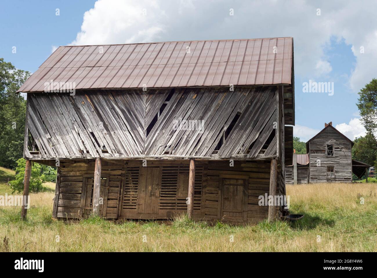 Rural scenery with buildings and fields Stock Photo - Alamy