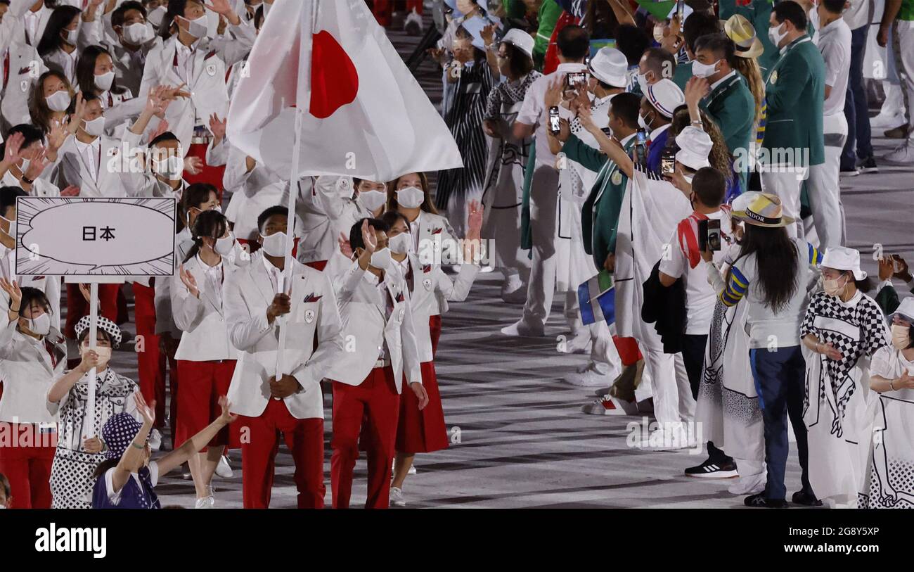 Tokyo, Japan. 23rd July, 2021. Host nation Japan arrives during the ...