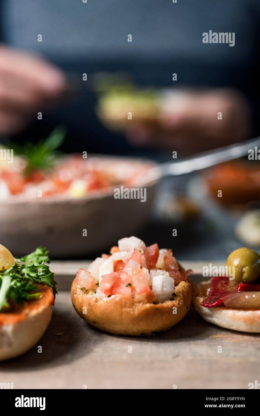 Preparing appetizers hi-res stock photography and images - Alamy