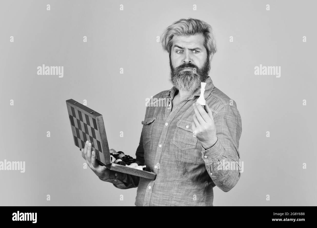 Exercise for brain. Teacher chess competition. Board game. Man playing ...