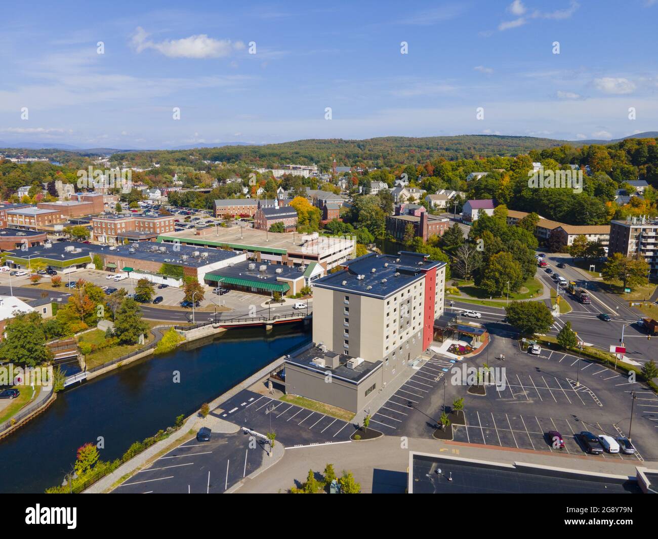 Laconia city center and Opechee Bay of Lake Winnipesaukee aerial view ...
