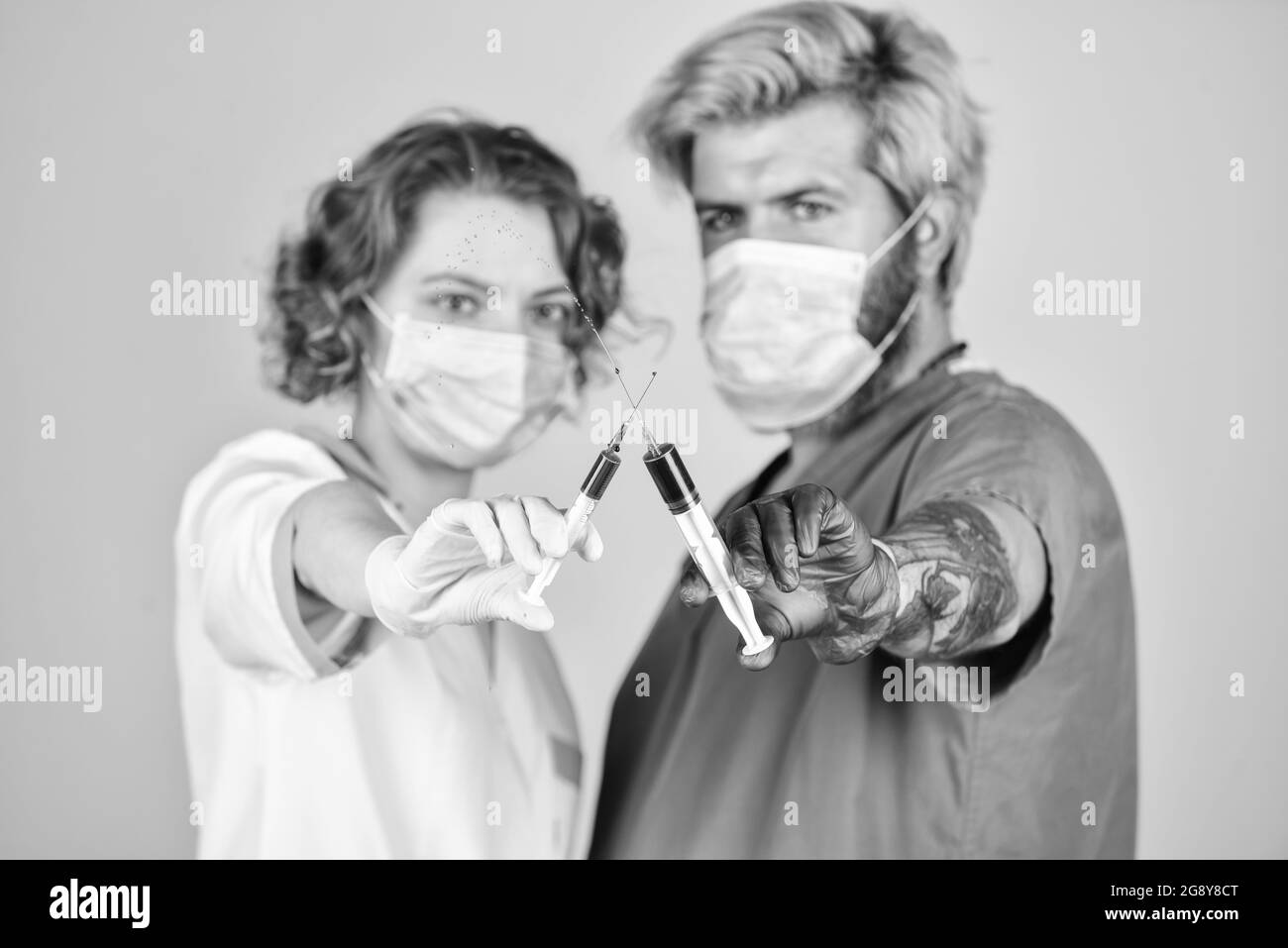 teamwork concept. virus infection injection vaccine. doctors wear ...