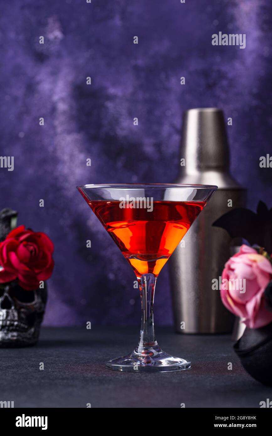 Halloween martini cocktail on purple background Stock Photo - Alamy