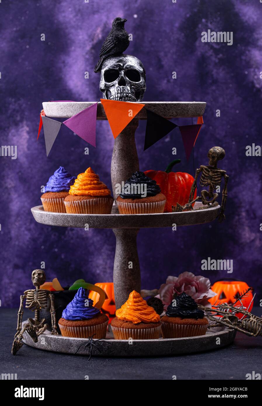 Halloween cupcakes with color cream Stock Photo - Alamy