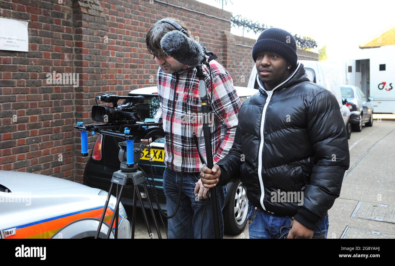 Film Crew Lining Up a Shot for a Scene Take Stock Photo - Alamy