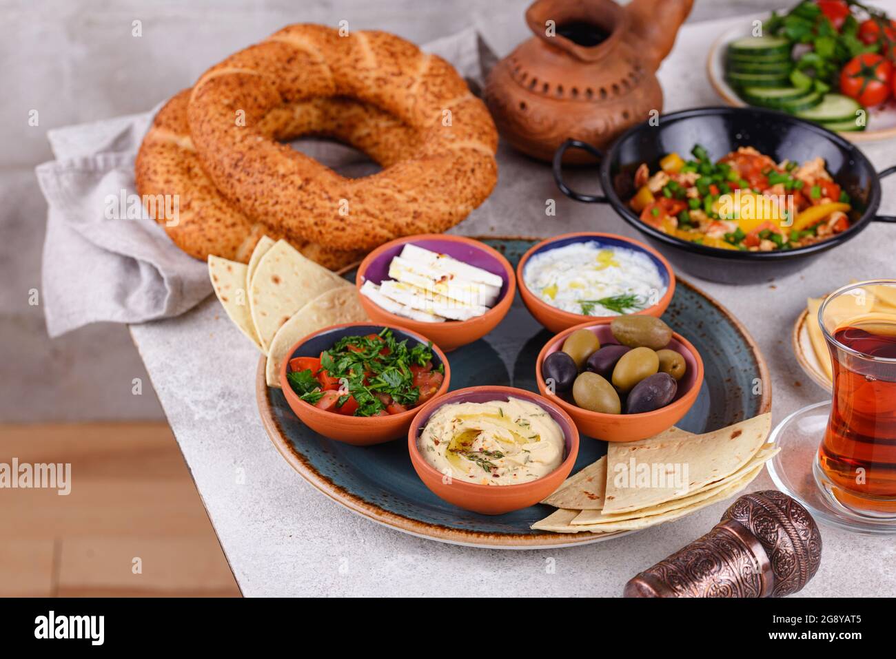 Traditional Turkish breakfast with meze and simit Stock Photo - Alamy