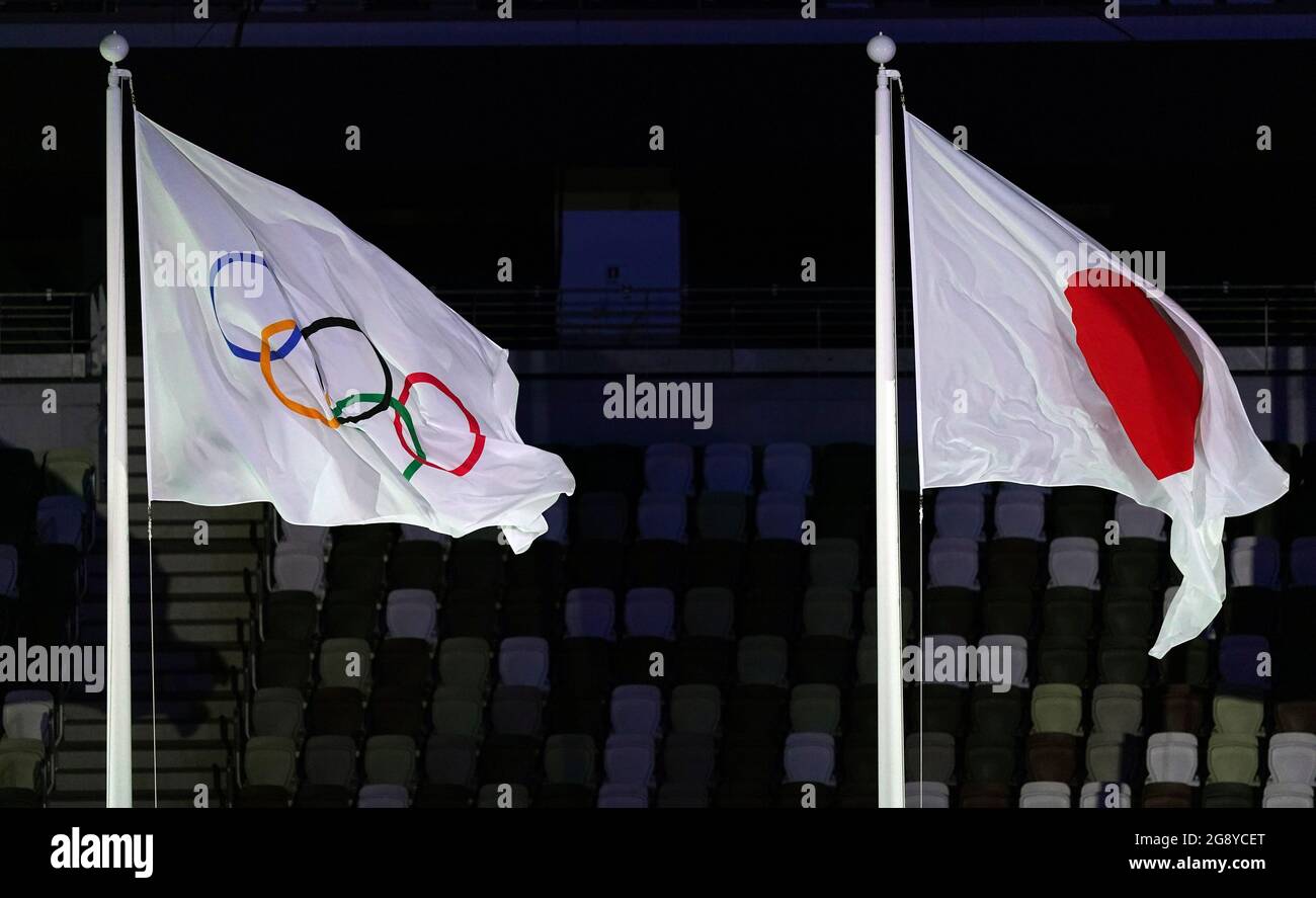The Olympic flag and the National Flag of Japan during the opening ...
