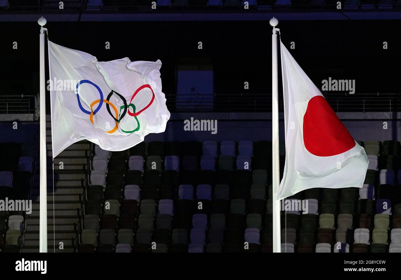 The Olympic flag and the National Flag of Japan during the opening ...