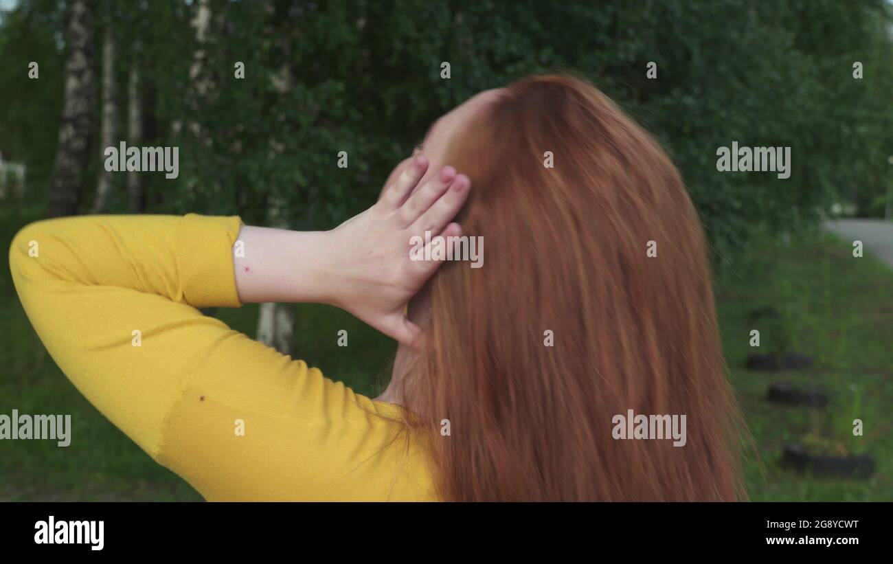 Loose long natural red hair Stock Photo - Alamy