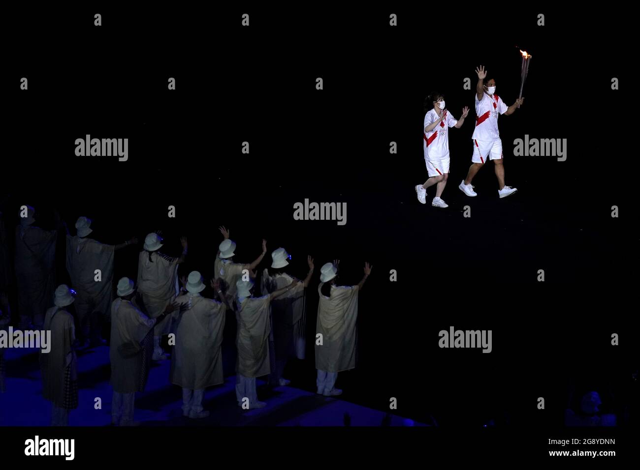 Olympic torch-bearers during the opening ceremony of the Tokyo 2020 ...