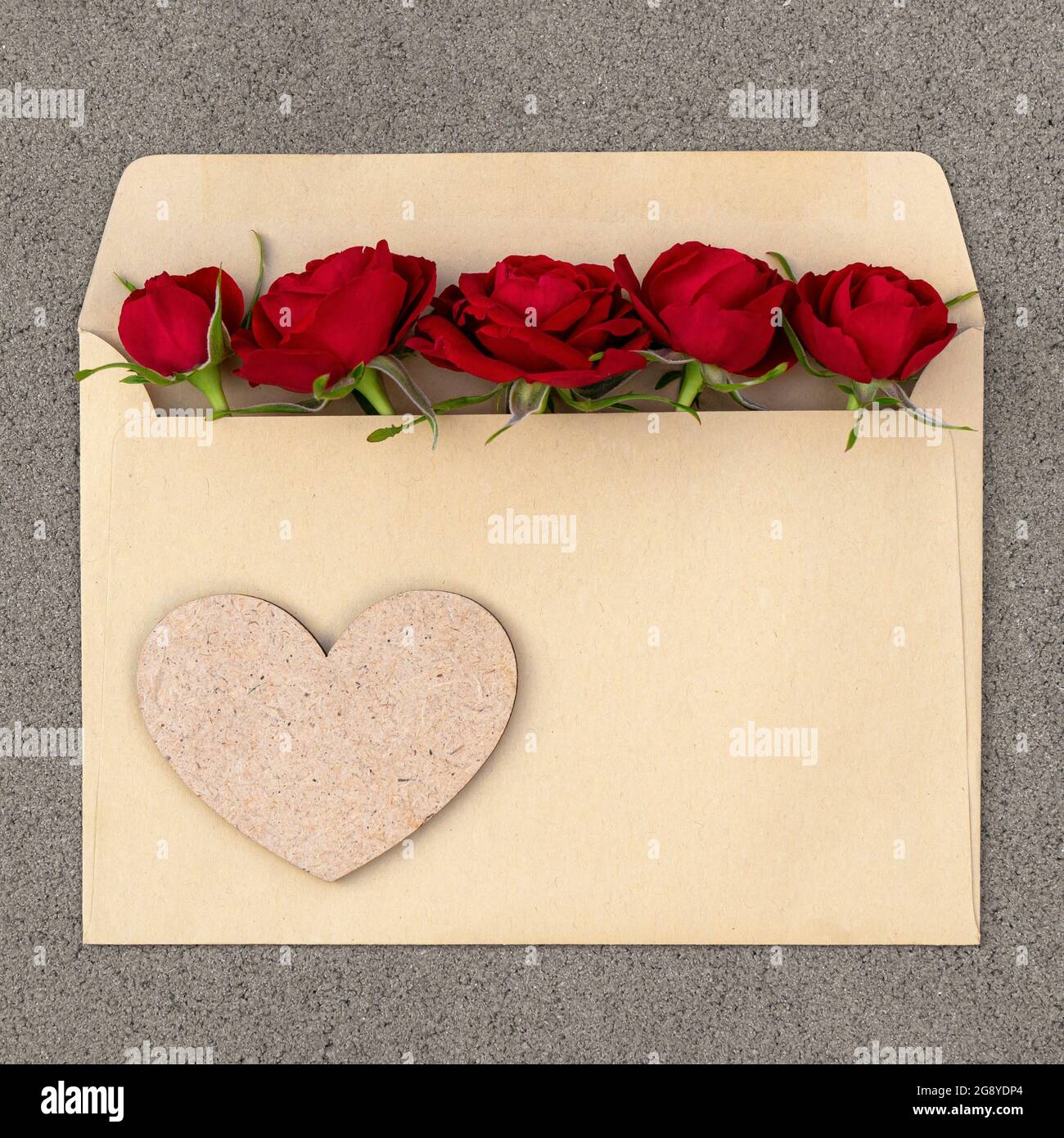 Beautiful roses in envelope hi-res stock photography and images - Alamy