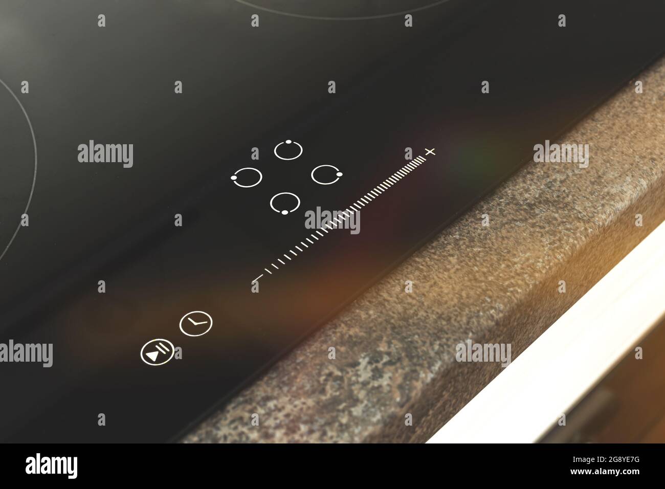 New electric stove with induction cooker cooktop in kitchen, closeup ...