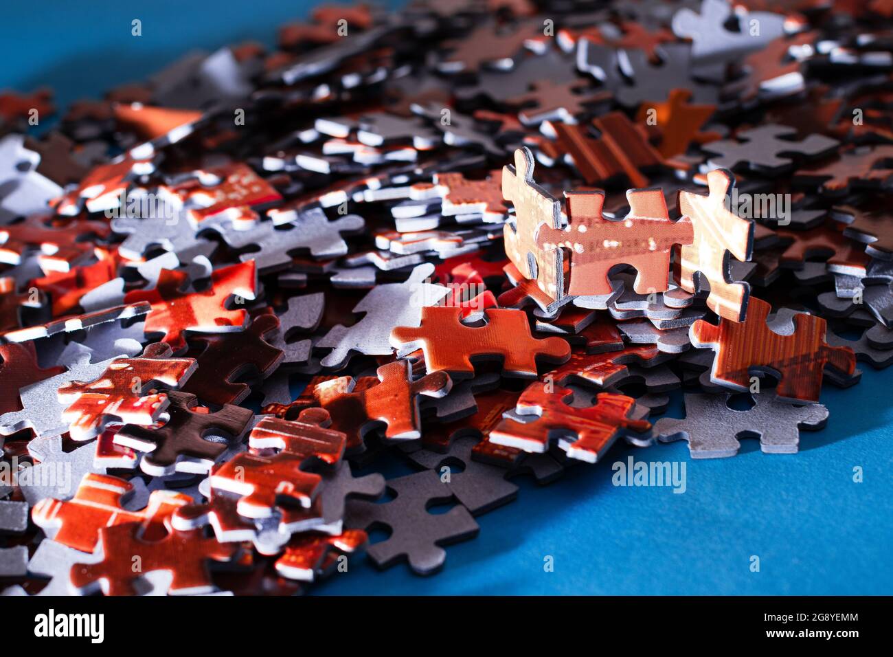 Mixed Peaces of a Colorful Jigsaw Puzzle Lie on the Blue Background ...