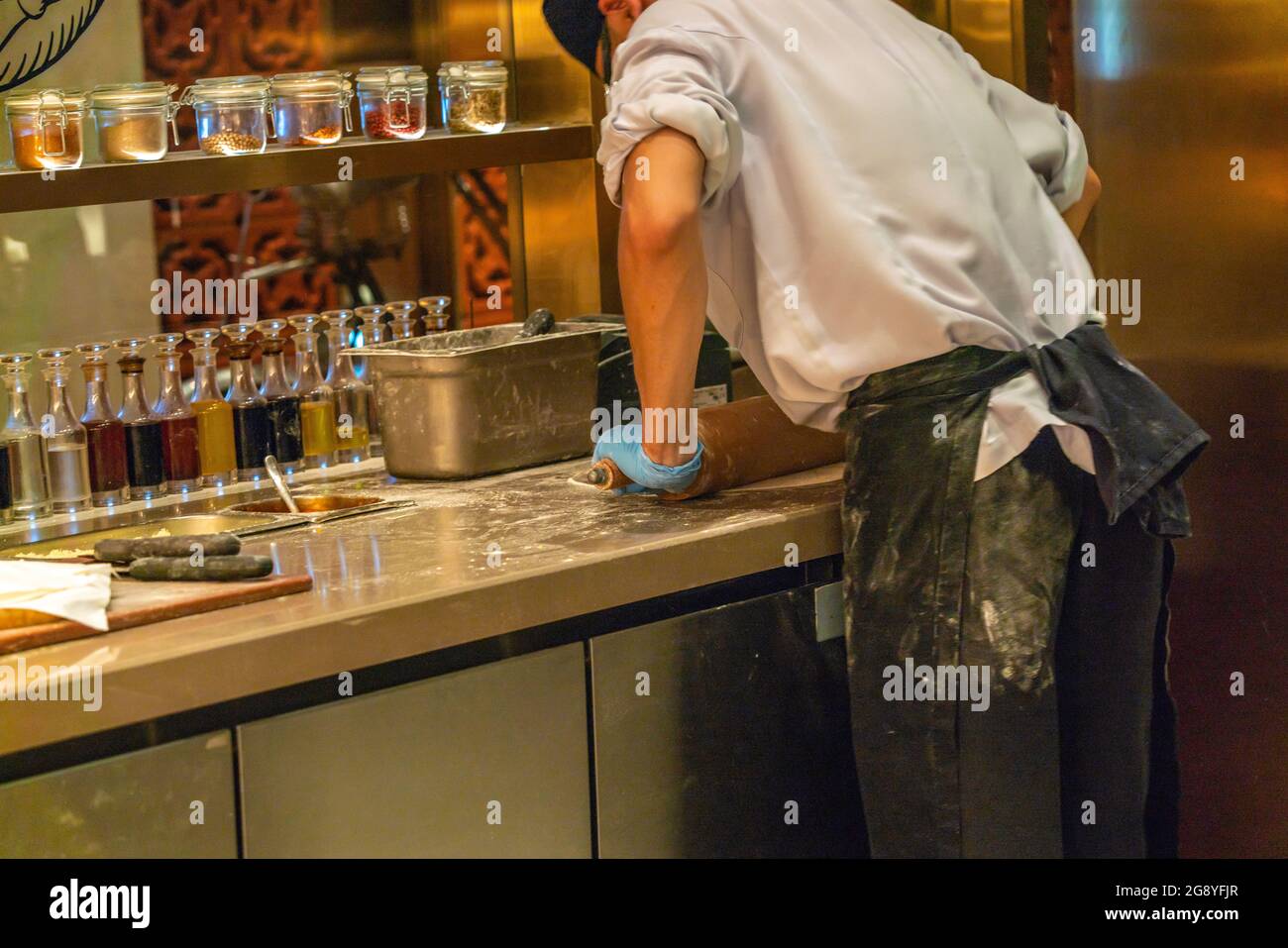 Making pizza at an Italian restaurant Stock Photo - Alamy