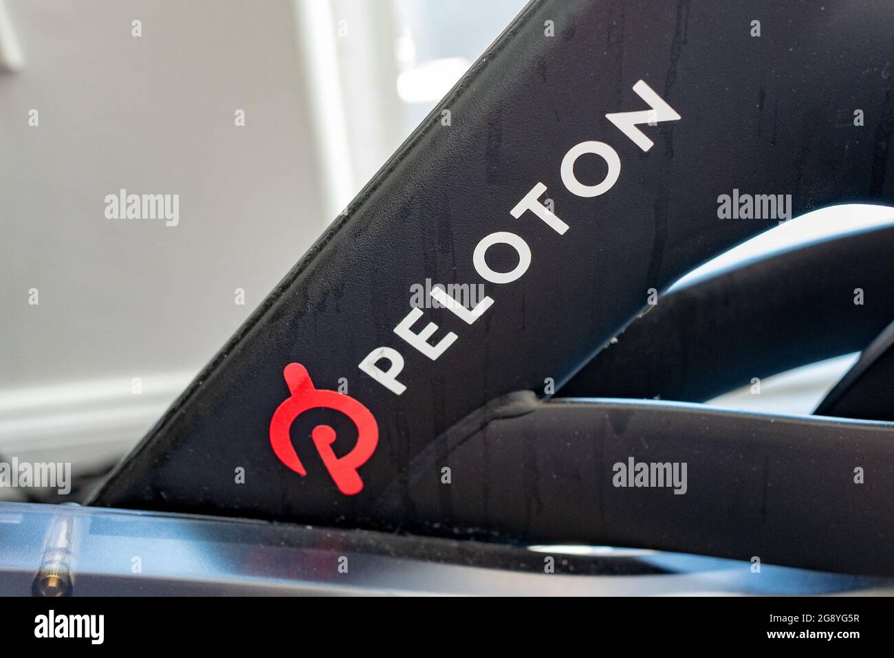 Close-up of logo for Peloton on exercise bicycle, San Francisco ...