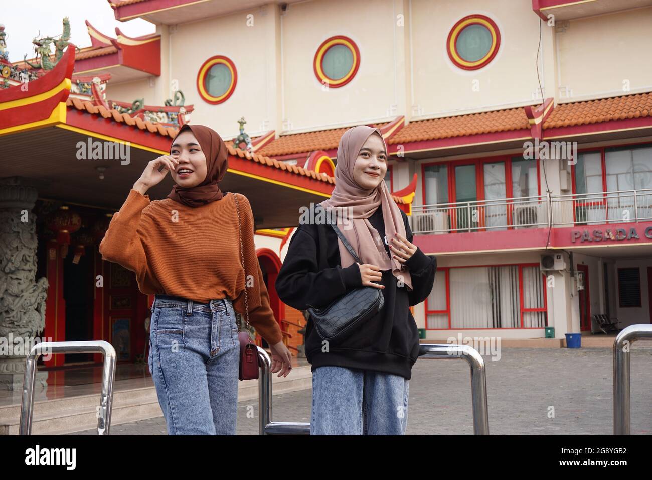 Two beautiful moslem girls with a natural background. The girls ...