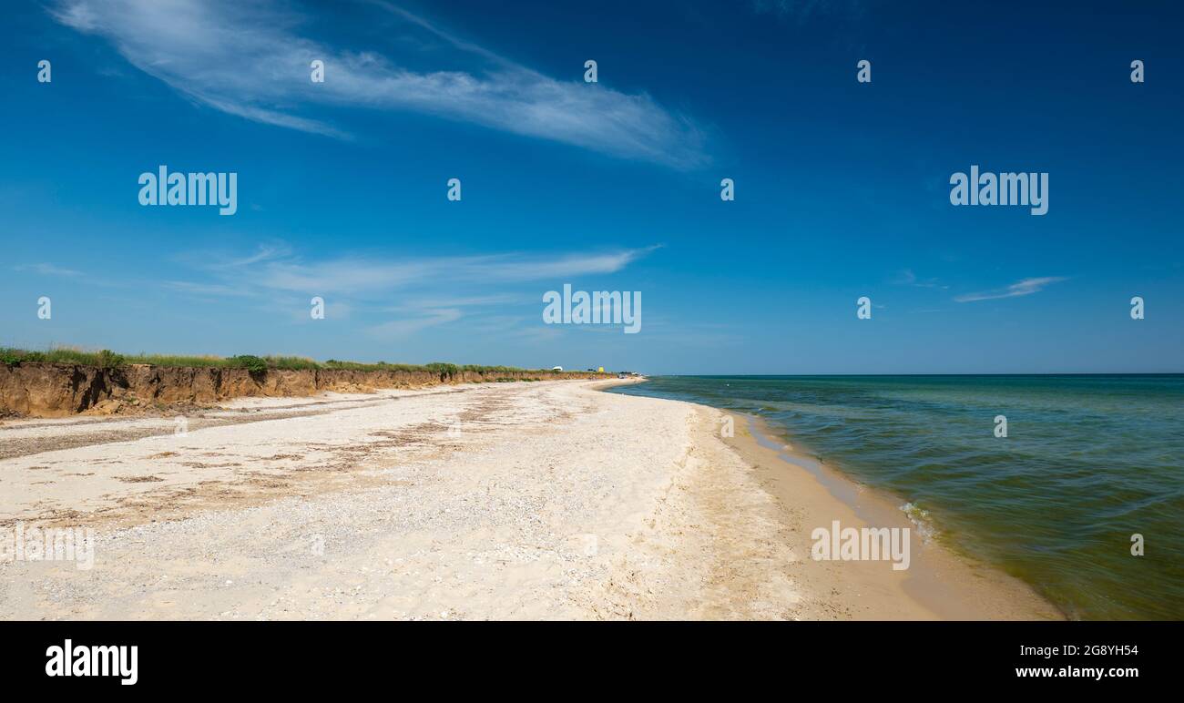 Long big beach near the sea. Seascape. Beautiful Black Sea. Blue sky ...