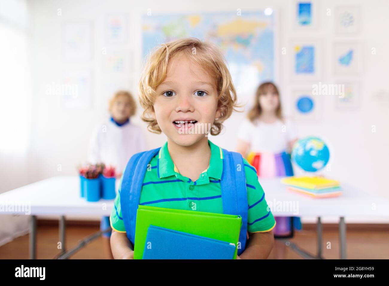Kids in school. Preschool children in class. Happy kids back to school ...