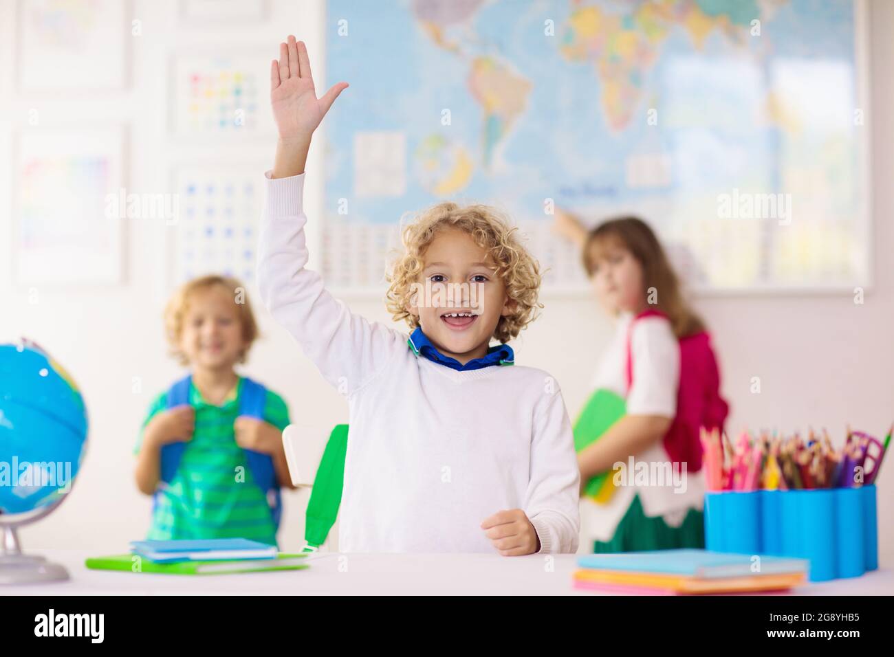 Kids in school. Preschool children in class. Happy kids back to school ...