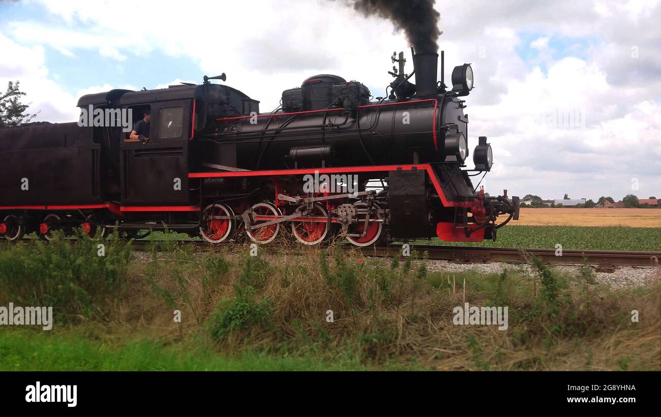 Steam locomotive on the track. Old train. Former rail transport Stock ...