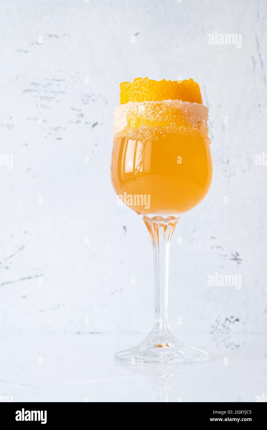 Glass of Brandy Crusta cocktail garnished with orange zest Stock Photo ...
