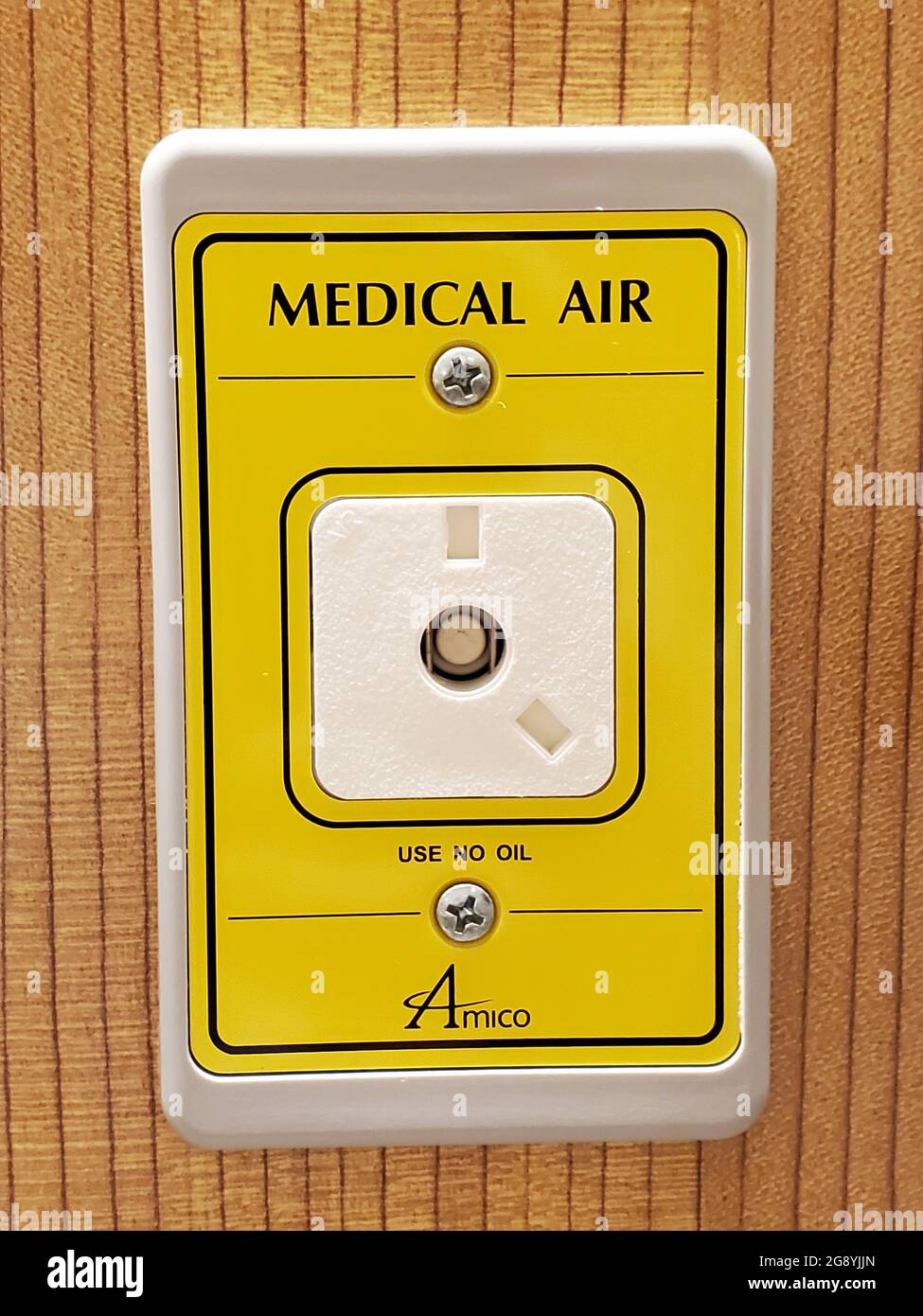 Close-up shot of the Amico medical air wall outlet with the company ...