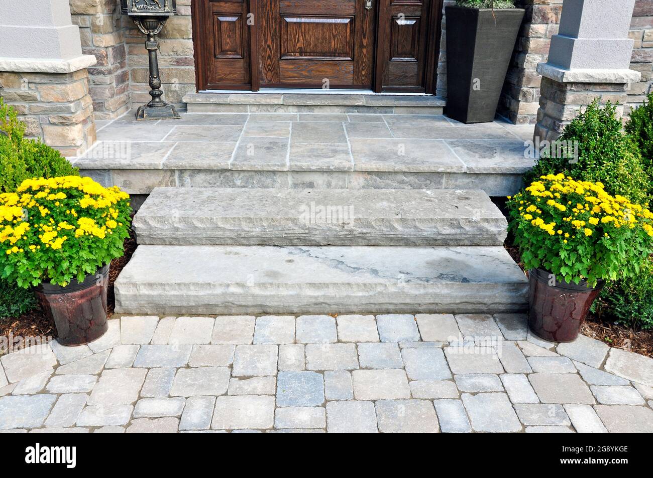 Flagstone applied to the original concrete veranda, natural stone steps ...