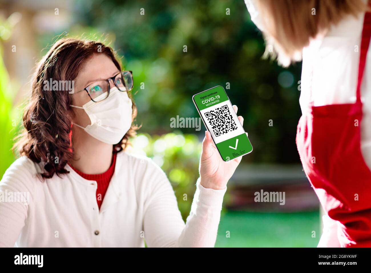 Digital covid-19 vaccination certificate on mobile phone. Coronavirus ...