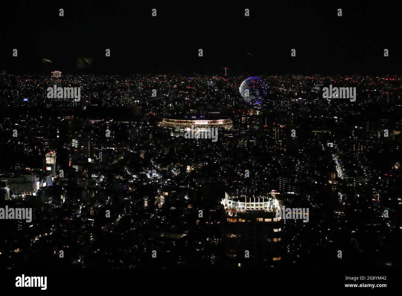 Tokyo, Japan. 23rd July, 2021. A fleet of drones over the Olympic ...