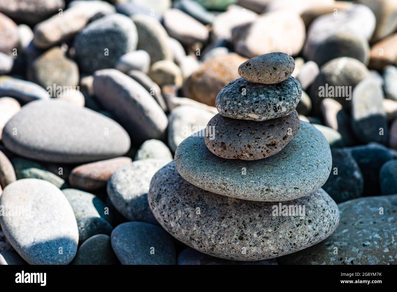 Beach sea stones as a natural textured background Stock Photo - Alamy