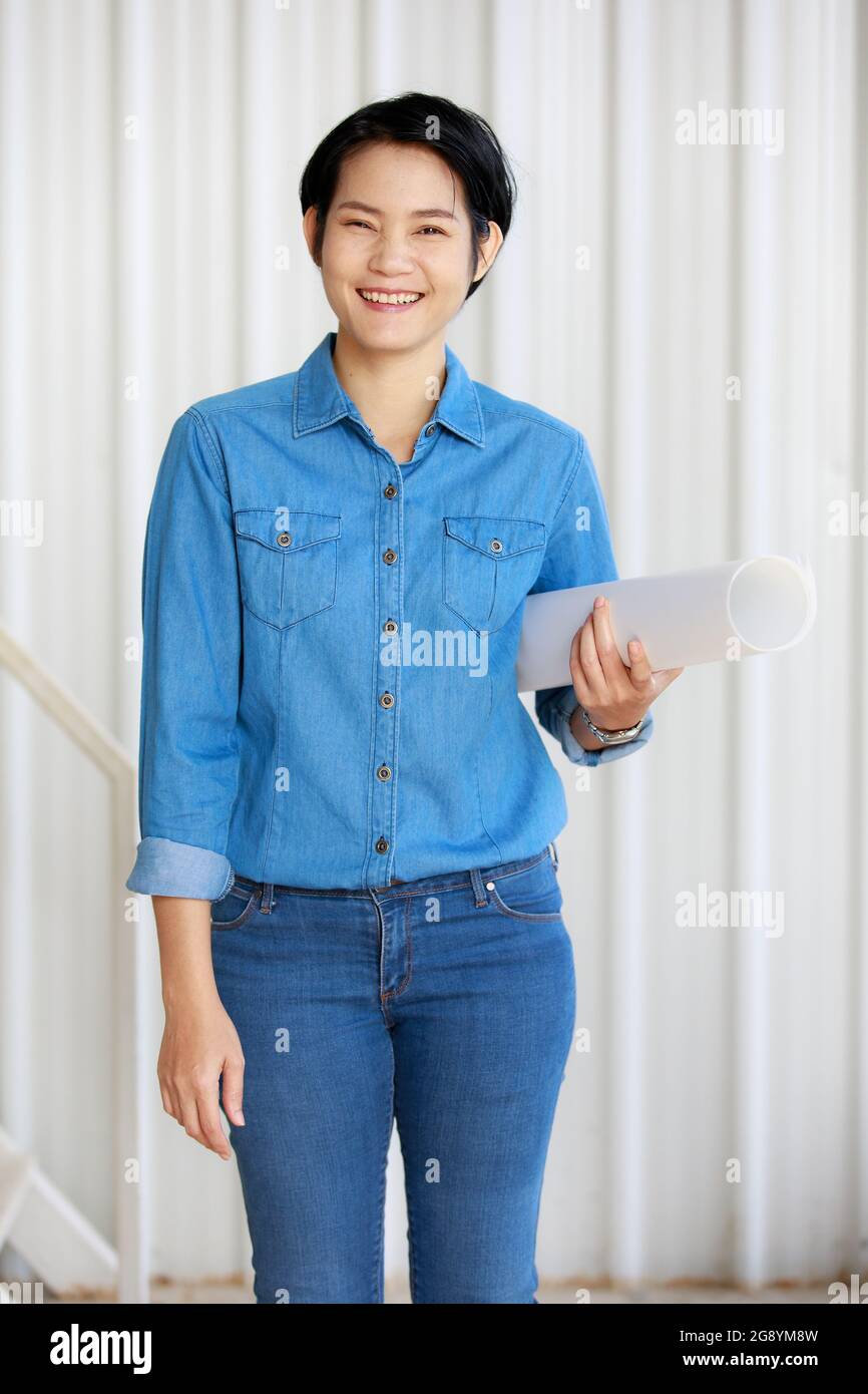 Portrait of female engineer with self-confidence and friendly manner ...