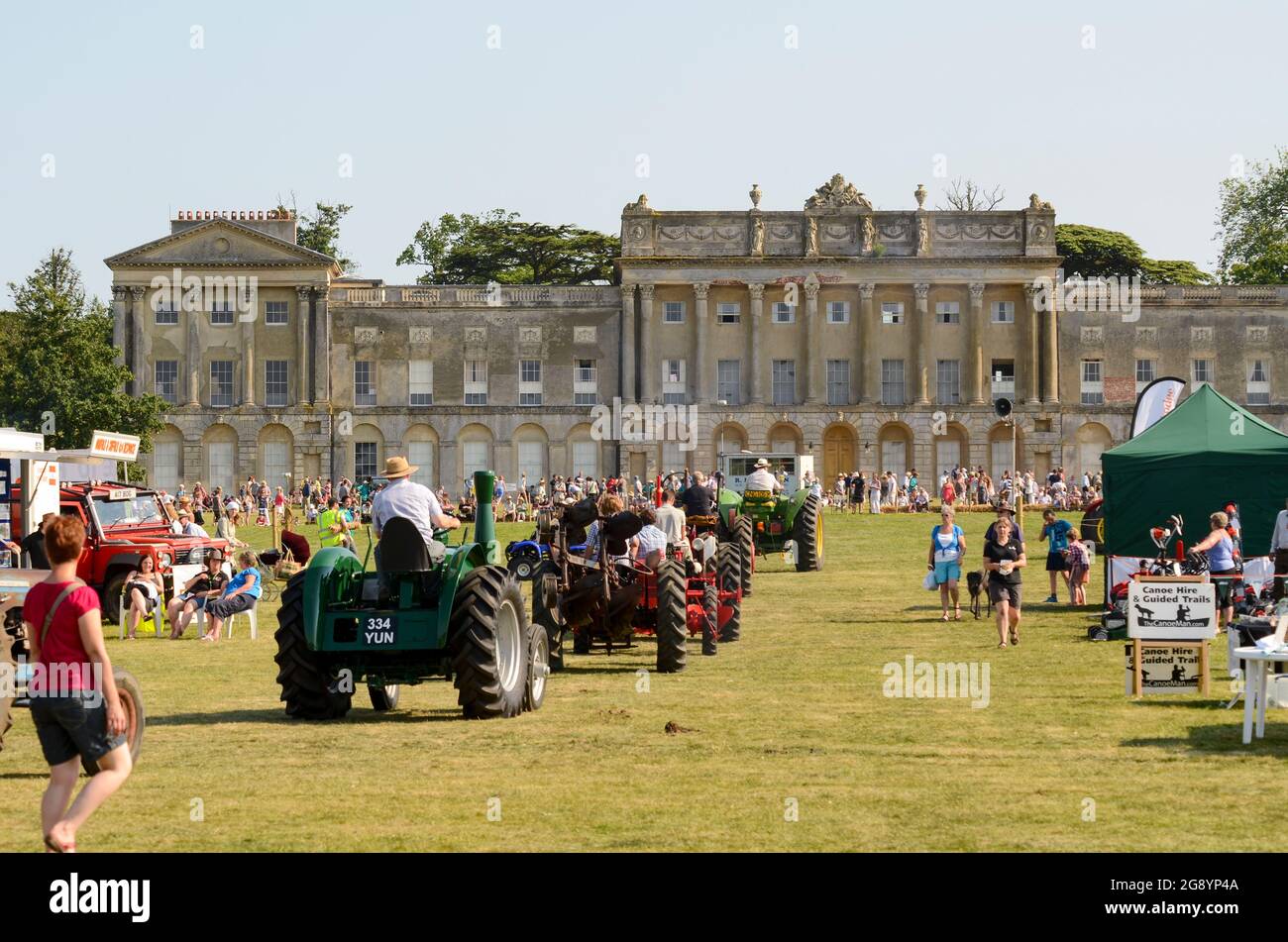 Heveningham Hall county fair, with vintage tractors parading in front ...