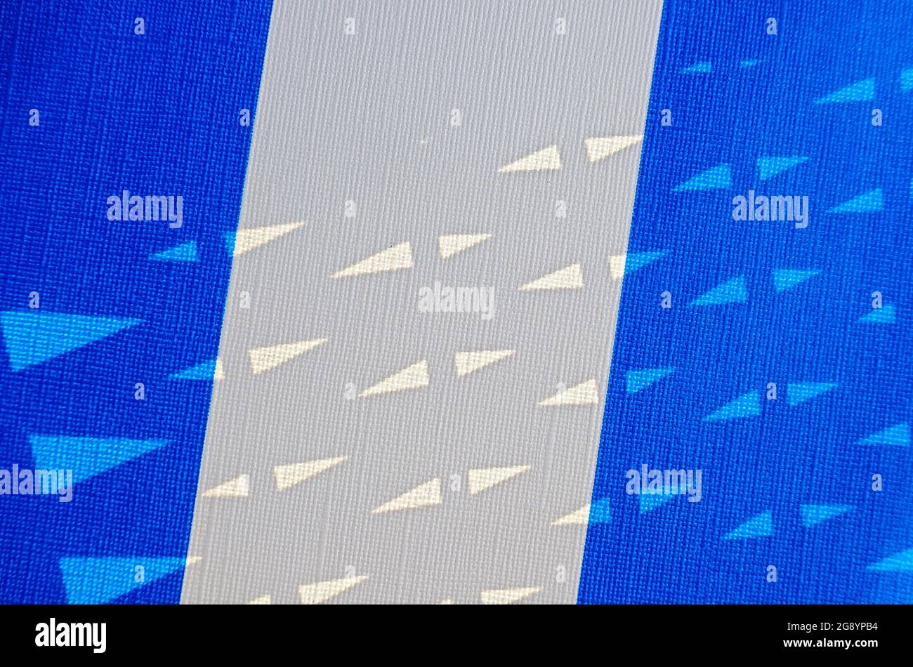 blue and white colored plastic with embossing of textile pattern and ...