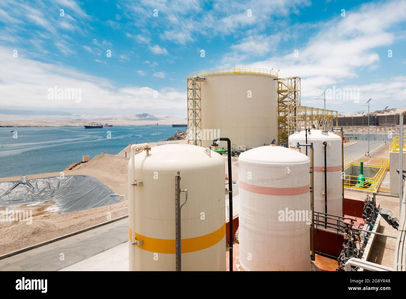 Desalination plant at port Punta Padrones with Caldera bay on de back ...