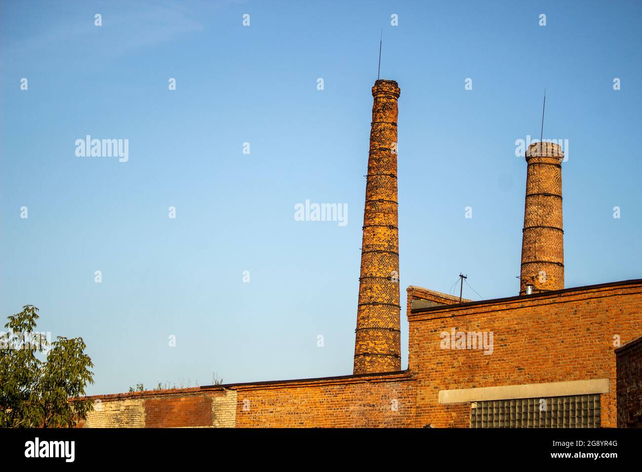 Brick pipe. Old factory building. Brick building. The architectural ...