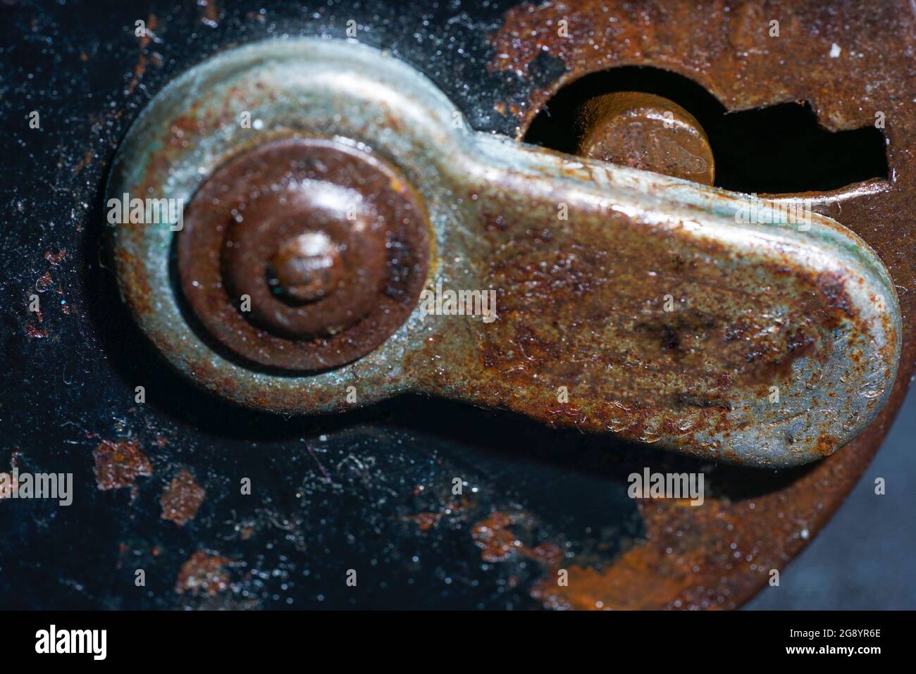 Old padlock with rust but fully functional photographed in the studio ...