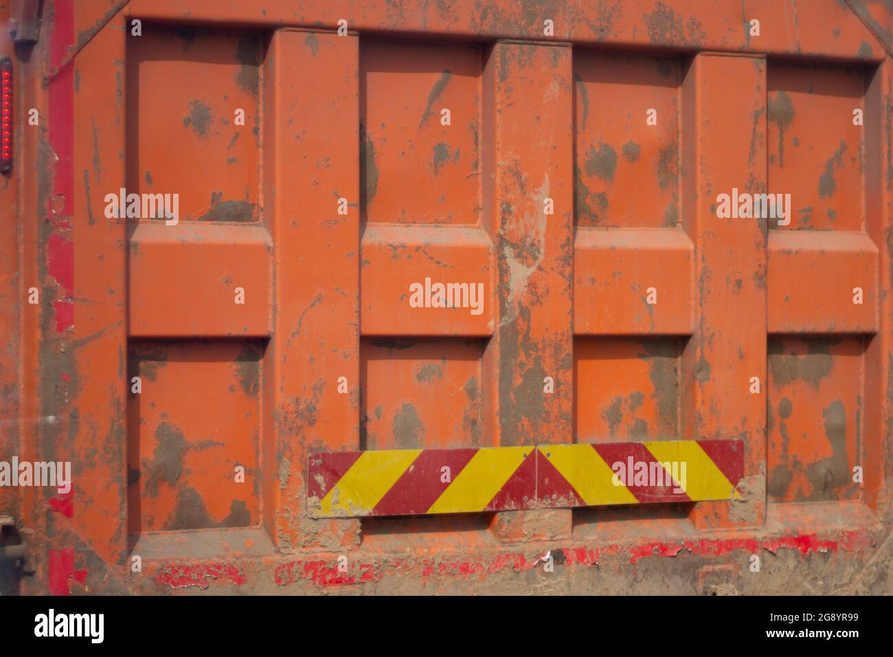 Truck on the track. Details of a large car. Work car on the highway ...