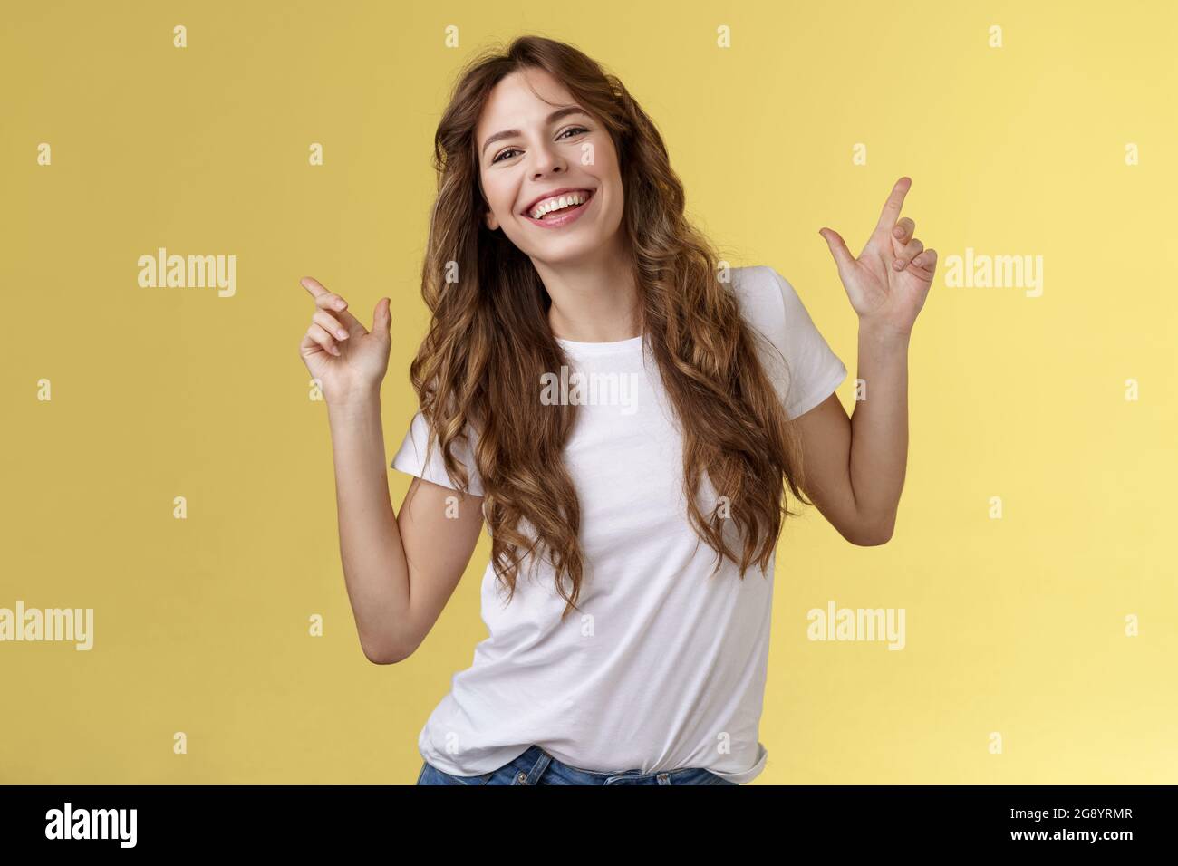 Outgoing cheerful attractive woman curly haircut wear casual white t ...