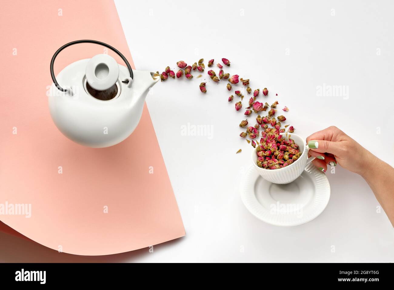 Dry rose flower herbal tea. Surreal flat lay with dried rose flowers ...