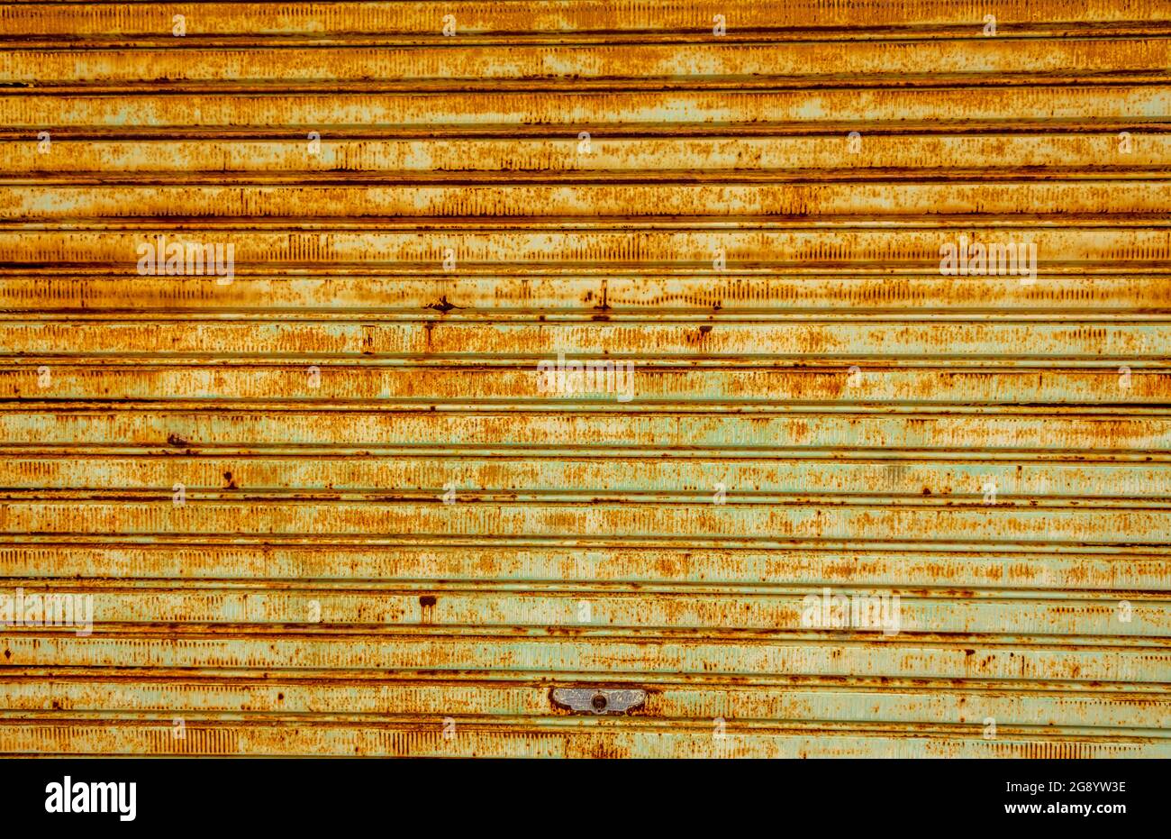 Closeup of old rust metal shutter of car garage Stock Photo - Alamy