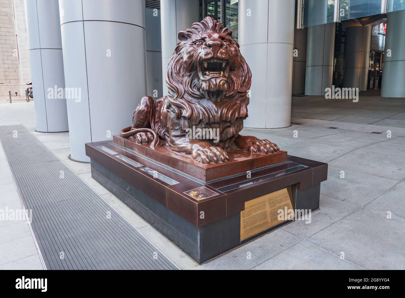Hong Kong - December 10, 2016: Bronze lion statue at the entrance of ...