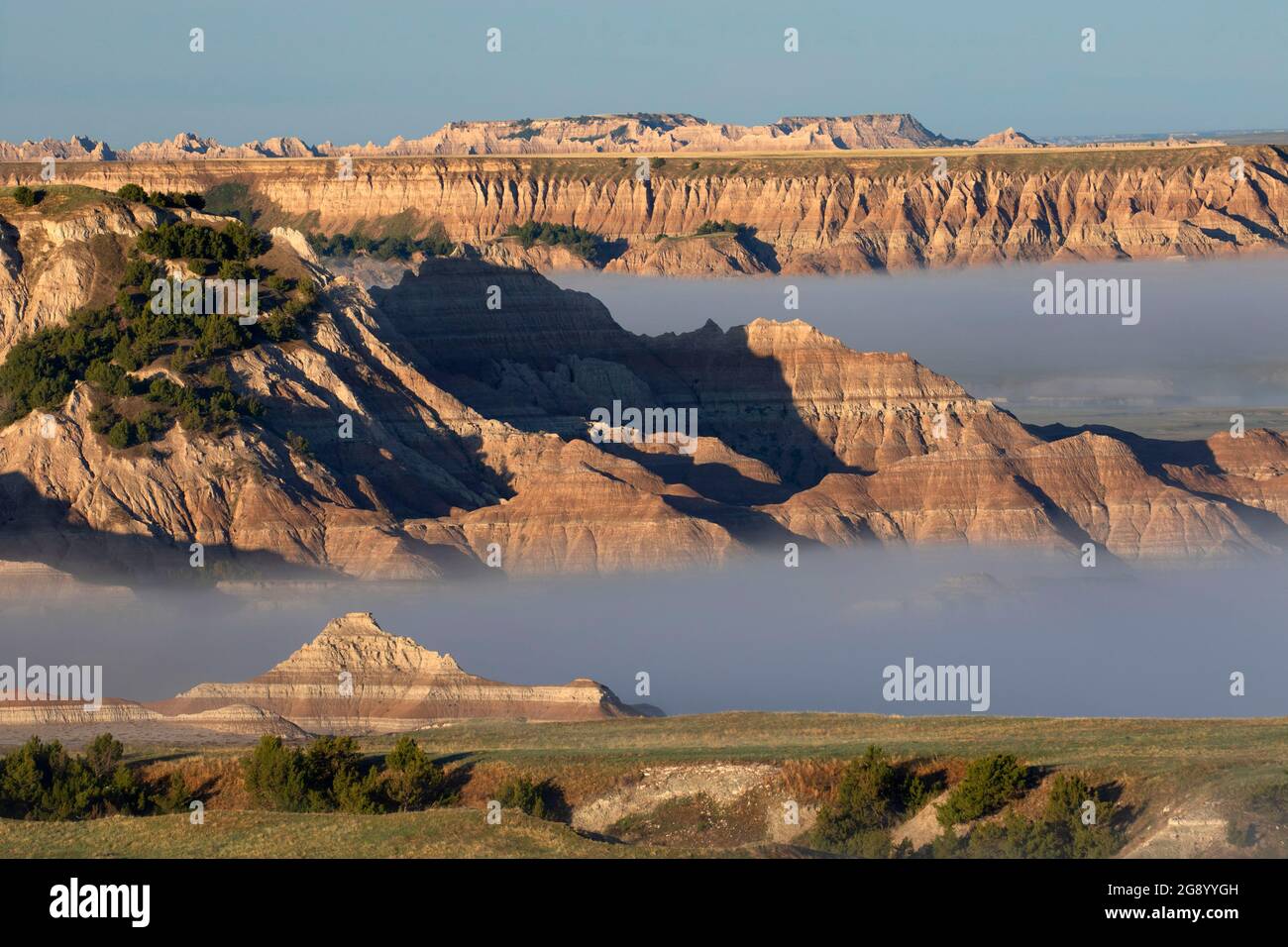 Badlands with fog from Hay Butte Lookout, Badlands National Park, South ...